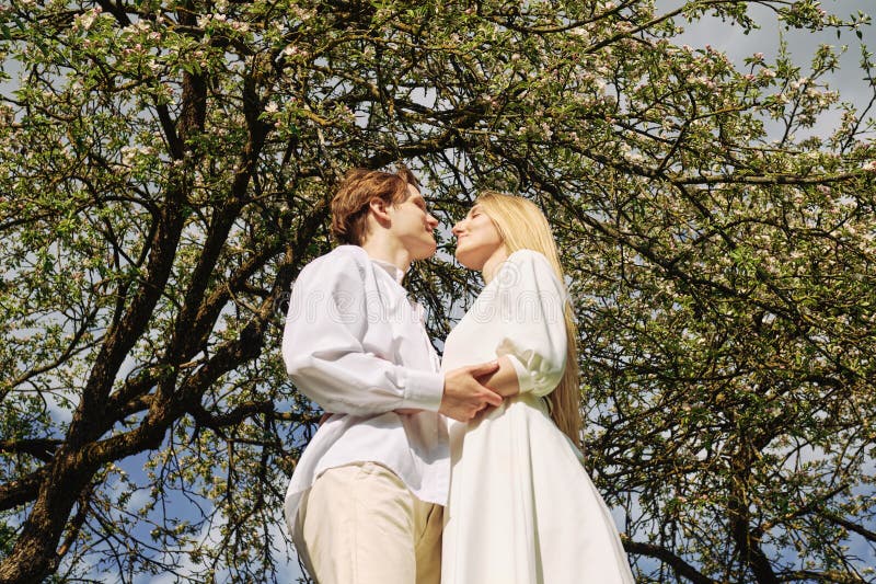 Low Angle View at Couple in Love Hug Each Other Stock Image - Image of ...