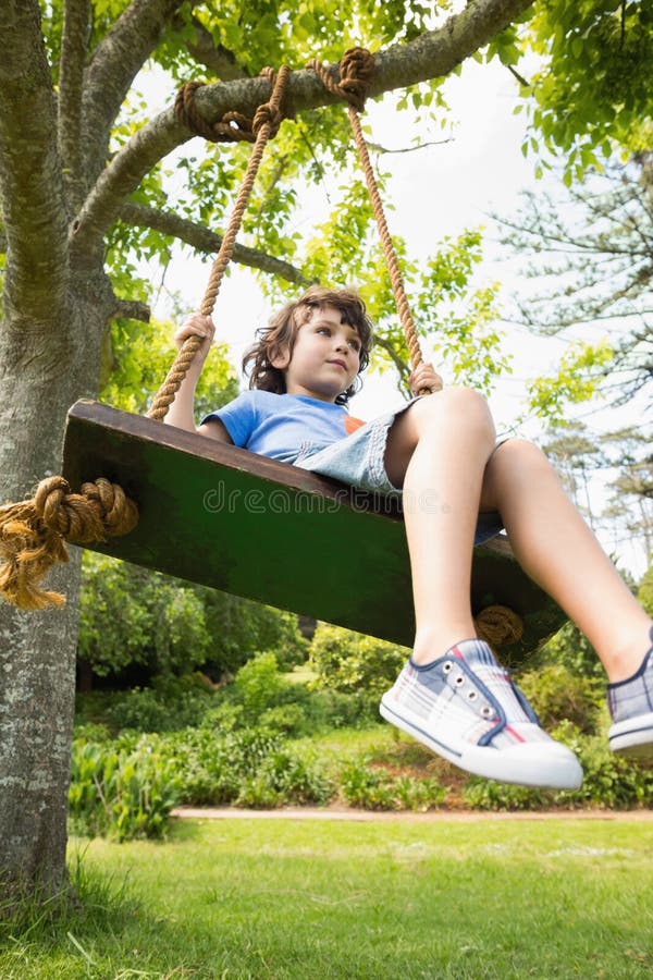 Low Angle View Cute Little Boy Swing Stock Photos - Free & Royalty-Free ...