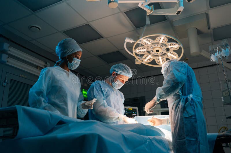 Low-angle View of Diverse Cooperating Team of Doctors, Surgeons and ...