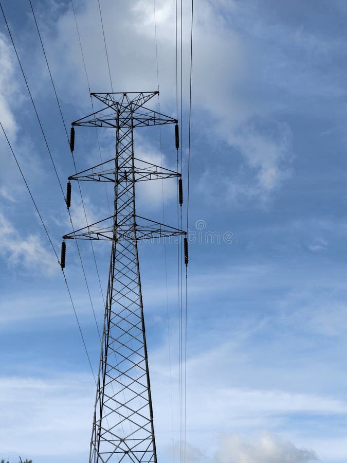 Low Angle View of Electricity Pylon Against Blue Sky Stock Image ...