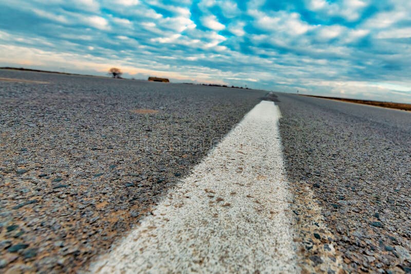 Low Angle View of Empty Road through Countryside Stock Image - Image of ...