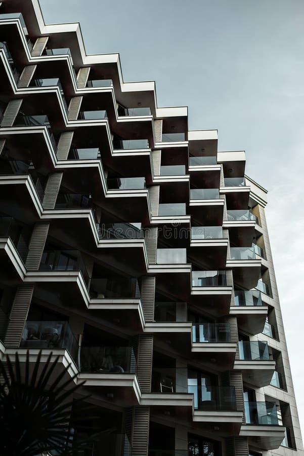 Facade of Building, with Triangular Balconies with Glass Railings Stock ...