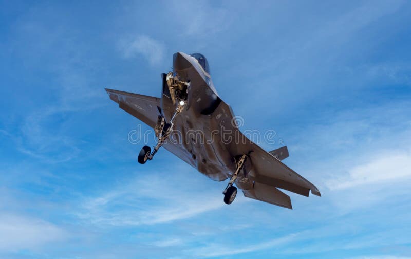 Low-angle View of Fighter Jet F35 Flying in the Blue Sky Editorial ...