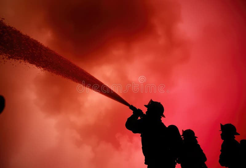 A Low Angle View of Firefighters Aiming a Powerful Fire Hose ...
