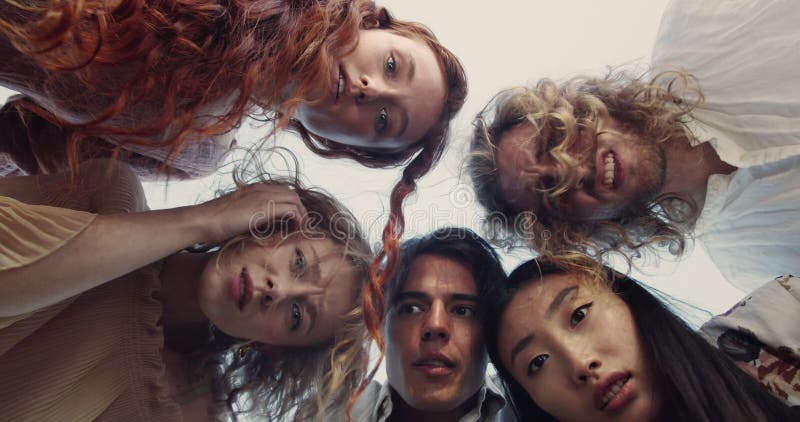 Low Angle View of Five Diverse People Looking To Camera and Talking ...