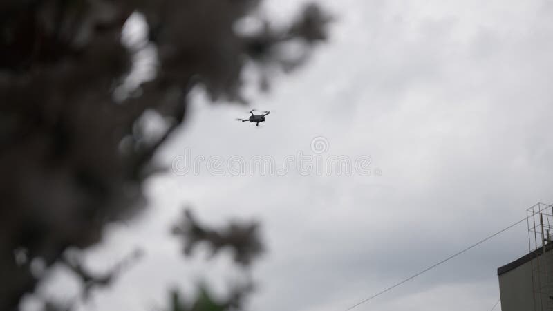 Low-angle View of FPV Drone Flying in Urban Development on Background ...