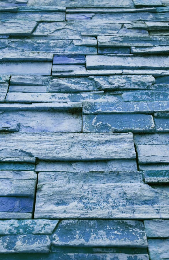 Low Angle View of Gradient Blue Colored Rough Stone Blocked Wall Stock ...
