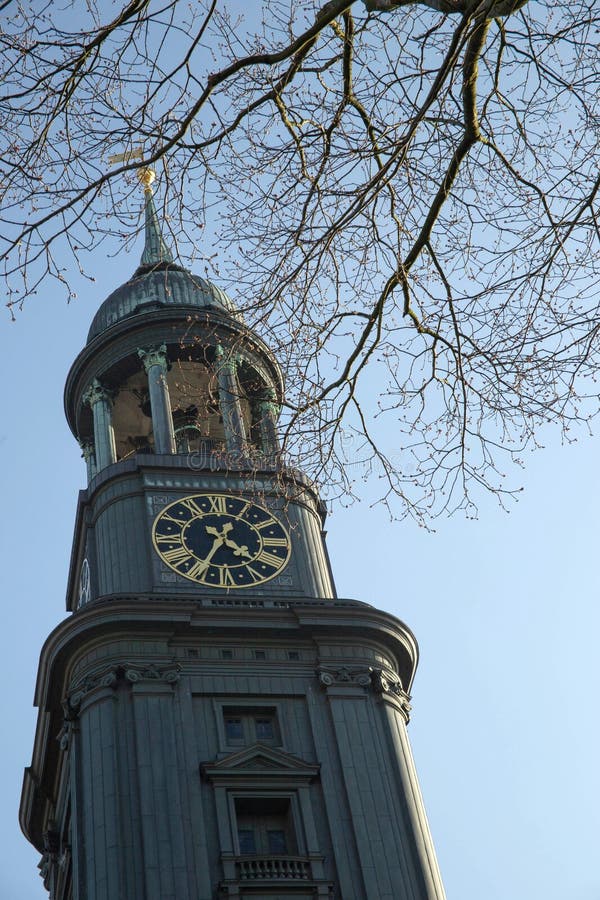 Closeup of St Michaelis Church Clock Tower with Spring Branches in ...