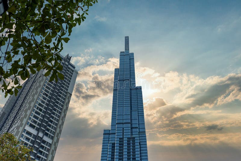 Low Angle View of High Rise Building with Sunrise Sky Background Stock ...