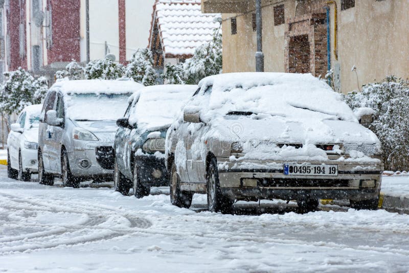 Low Angle View of a Line of Cars Covered with Snow. Editorial Image ...