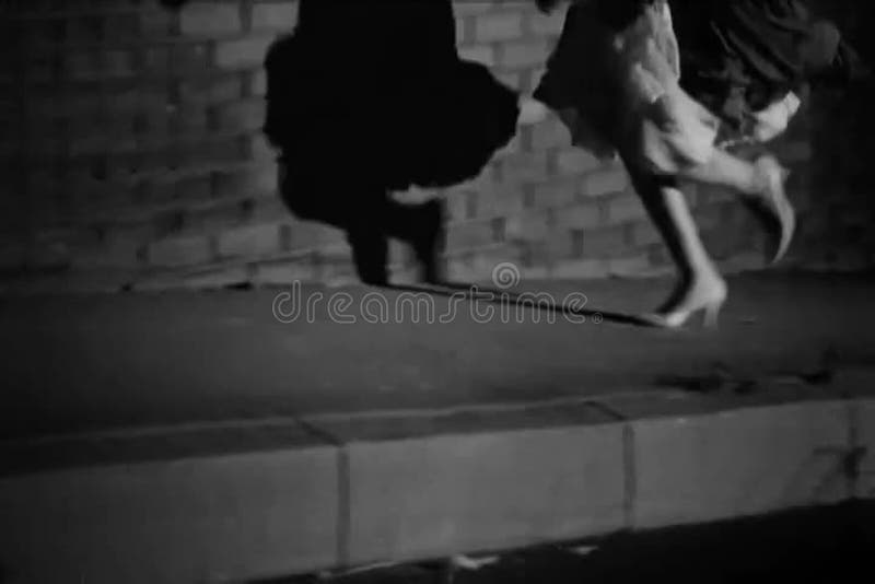 Low Angle View of Man Chasing Woman at Night Stock Footage - Video of ...