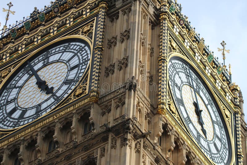 Low-angle View of a Modern Building with Clock on a Sunny Day Stock ...
