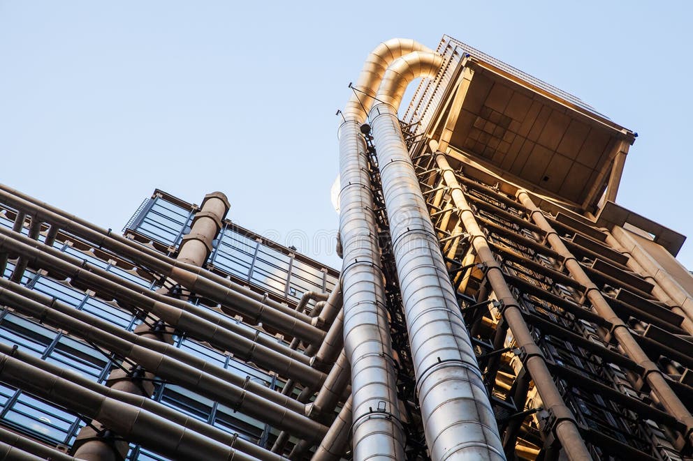 A Low-angle View of a Modern Building Emphasizing Its Exterior Pipework ...