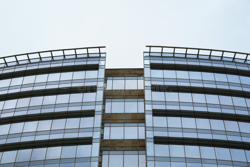 Low Angle View of Modern Building with Many Windows Against Clear Sky ...