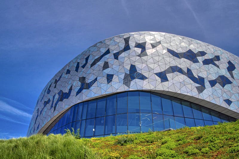 Low Angle View of a Modern Design Architecture of the Glass Window Wall ...