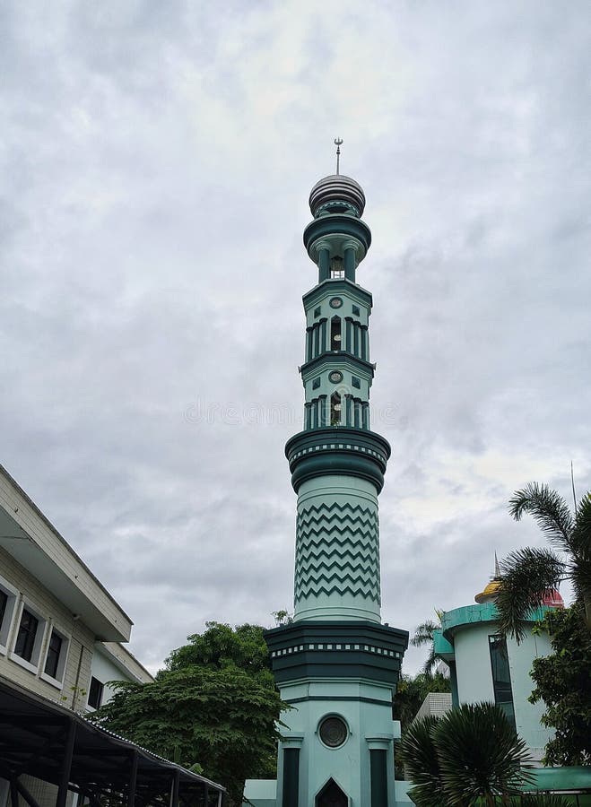 Low Angle View of Mosque Minaret Against Dramatic Cloudy Sky. Stock ...