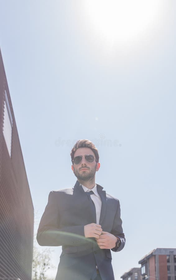 Low Angle View, One Young Man Buttoning Suit, Sky Day Sun Stock Photo ...
