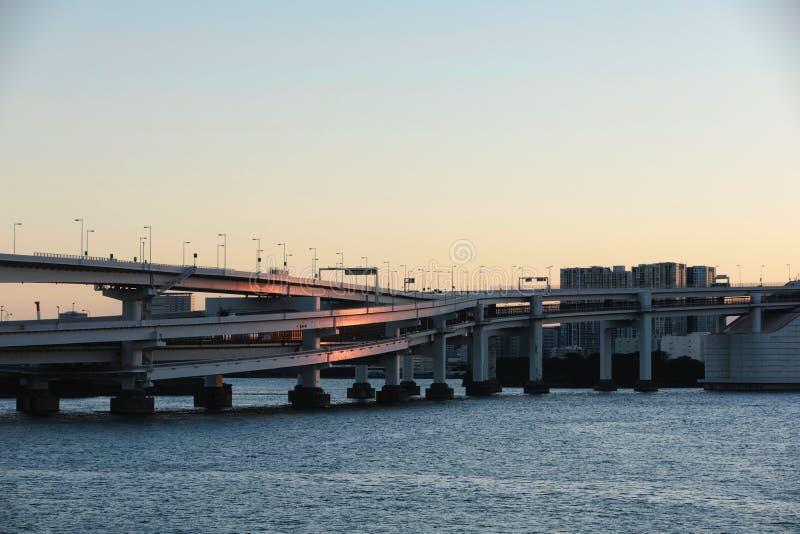 Low-angle View of Rainbow Bridge Above the Water in Tokyo, Japan Stock ...
