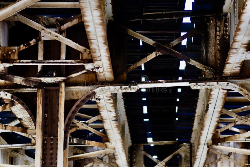 Low Angle View of a Rusty Metallic Ceiling of a Factory Under Sunlight ...