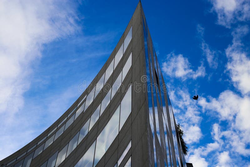 Edge of Modern Blue Glass Office Tower Stock Photo - Image of ...