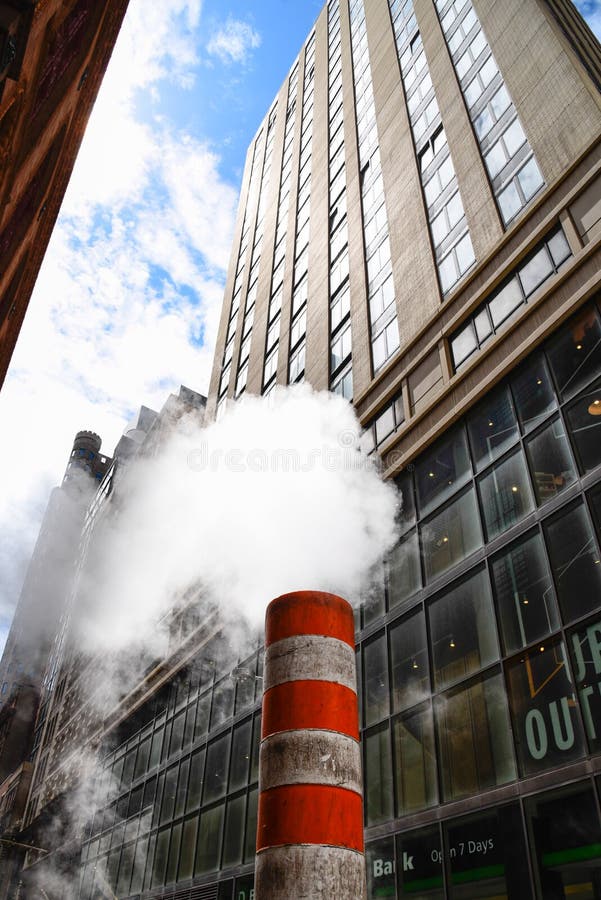 Low Angle View of Steam Coming Out Stack for Venting the Distric Stock ...
