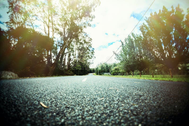 Low Angle View of Straight Road. Vintage Style Effect. Stock Photo ...