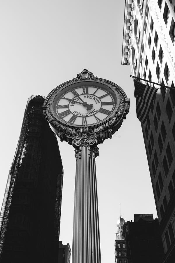 Low Angle View of a Street Clock in Grayscale Stock Photo - Image of ...