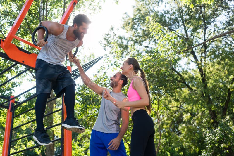 Young Man Doing Dip Exercise for Triceps on Gymnastic Rings Stock Image ...