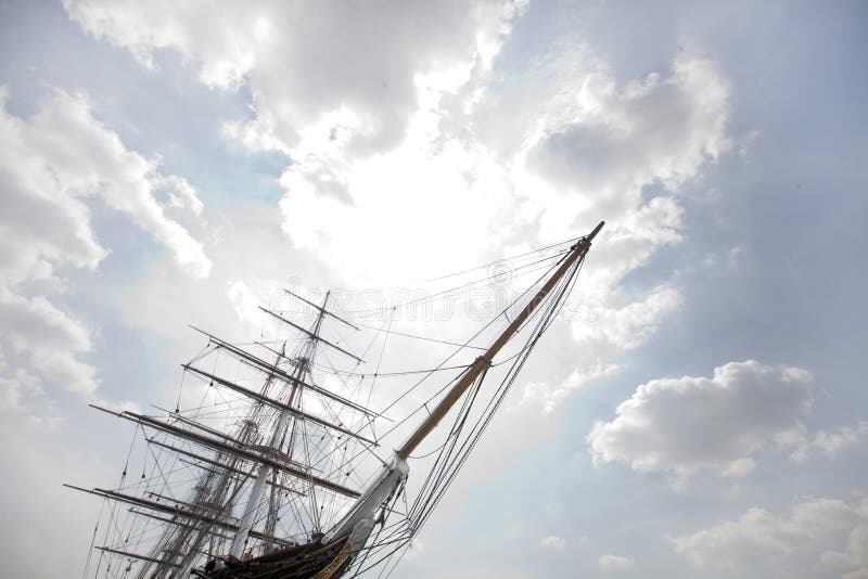 Low Angle View of Three Masted Ship Against Cloudy Sky Stock Image ...