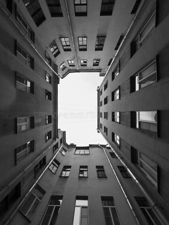 Low Angle View of Urban Buildings Forming a Courtyard Stock Image ...