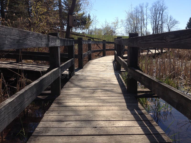 Low Angle View of a Walkway Bridge Over Water Stock Photo - Image of ...