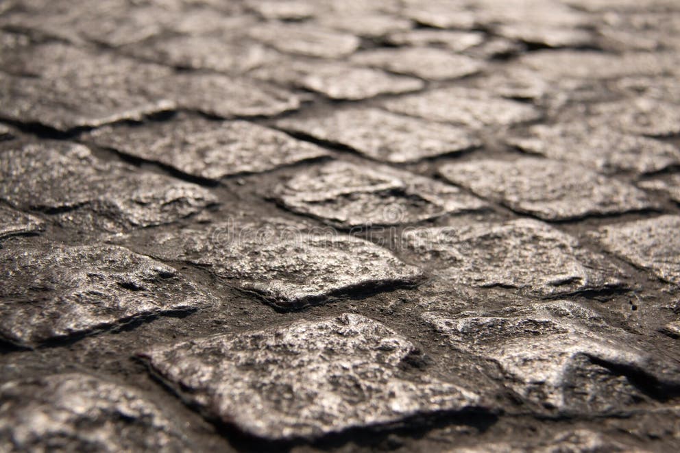 Low Angle View of Weathered Cobblestone Pavement with Textured Stone ...