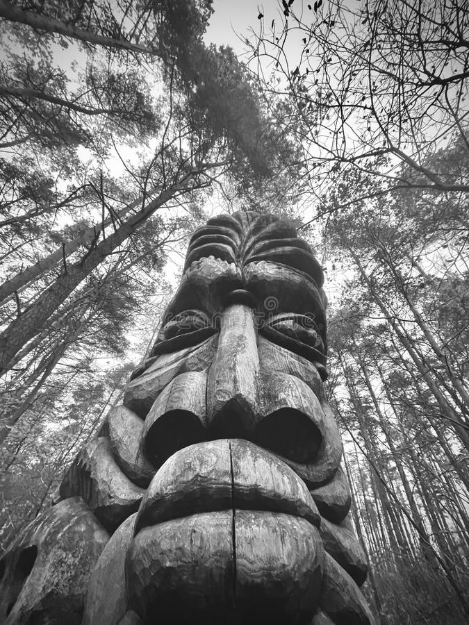 Wooden sculpture in forest stock photo. Image of sculpture - 344579796