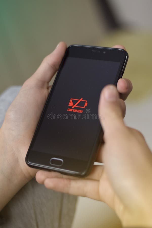 Low baterry stock image. Image of hand, smartphone, charging - 137972623