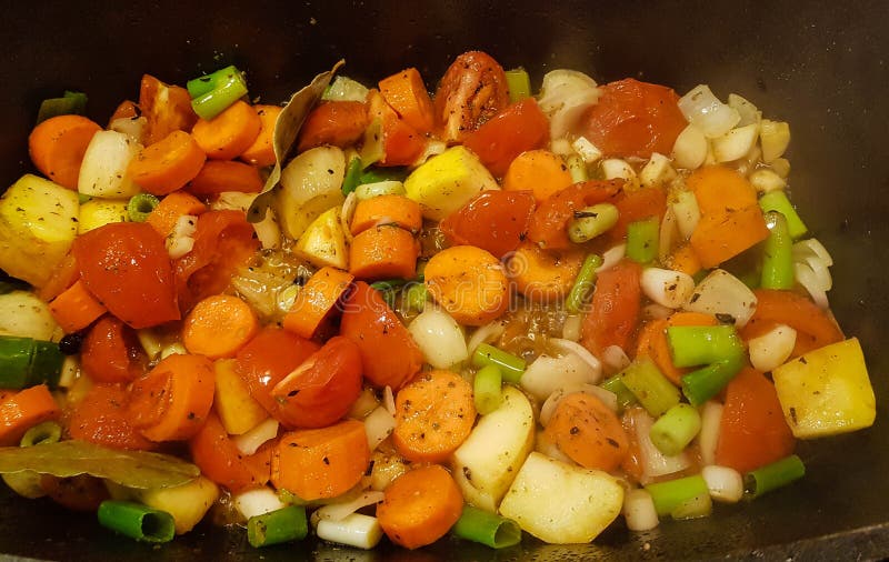 Oven cooked vegetables stock photo. Image of garlic - 201691912