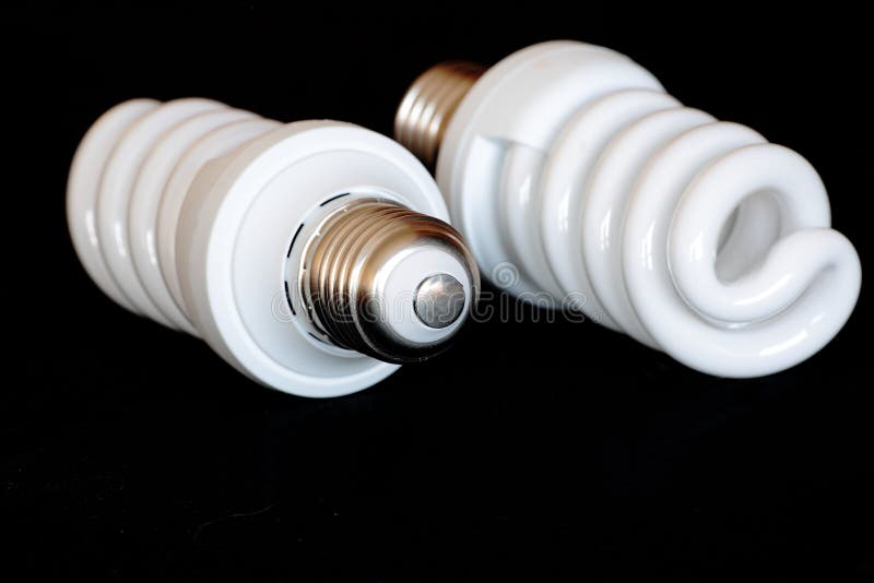 A Low Consumption Led Light Bulb on a Background of Euro Banknotes ...