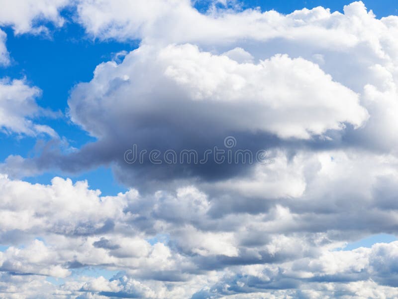 Low Dark Cumulus Clouds in Blue Sky in September Stock Photo - Image of ...