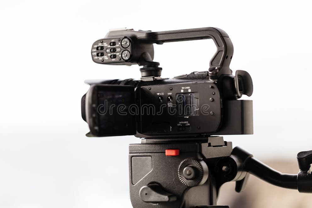 Low End Professional Video Camera on Fluid Head Tripod Stock Image ...