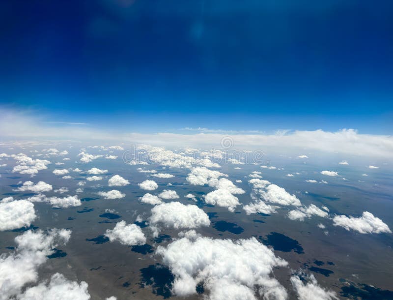 Low Hanging Puffy Clouds Over the Mongolian Steppes Stock Photo - Image ...