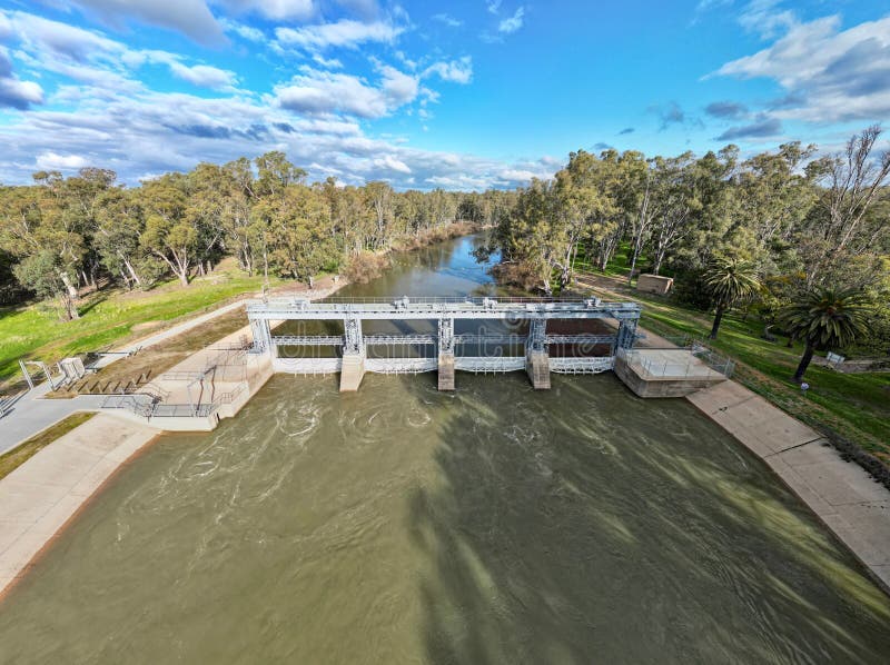 Low Head Dam on a River in the Park Stock Photo - Image of bridge ...