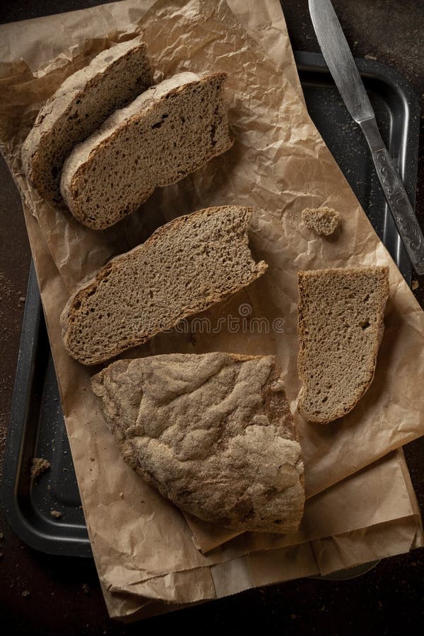 Low Key Food Photography. Black Rustic Bread on Dark Background Stock ...