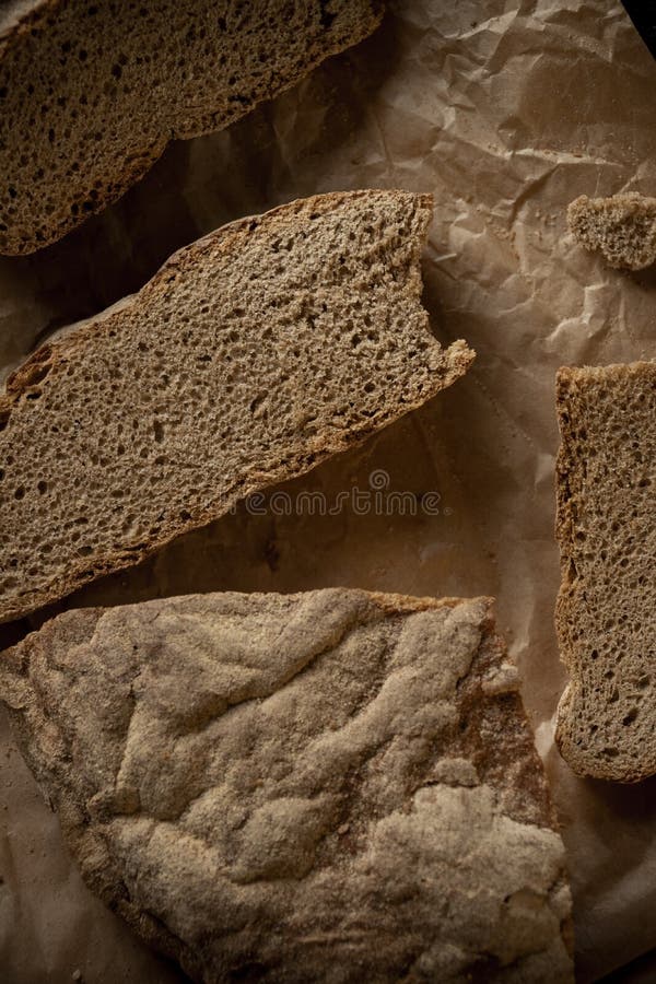 Low Key Food Photography. Black Rustic Bread on Dark Background Stock ...