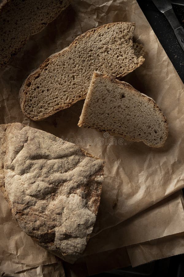 Low Key Food Photography. Black Rustic Bread on Dark Background Stock ...