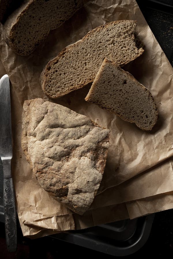 Low Key Food Photography. Black Rustic Bread on Dark Background Stock ...