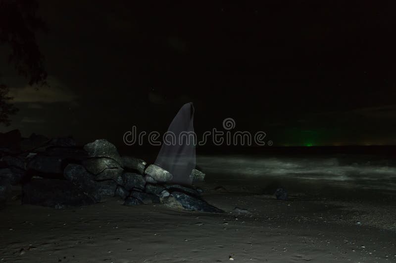 Low Key Image a Blur White Ghost on the Beach Stock Image - Image of ...