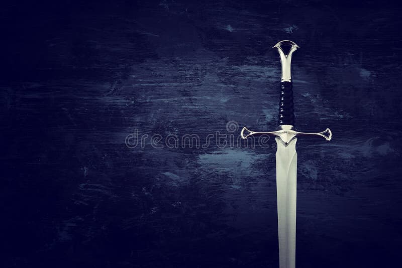 Low Key Image of Silver Sword. Fantasy Medieval Period. Stock Image ...