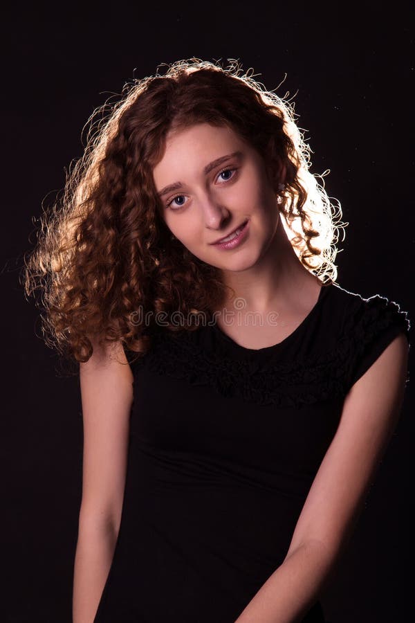 Low Key Shot of a Smiling Young Woman Stock Image - Image of adult ...