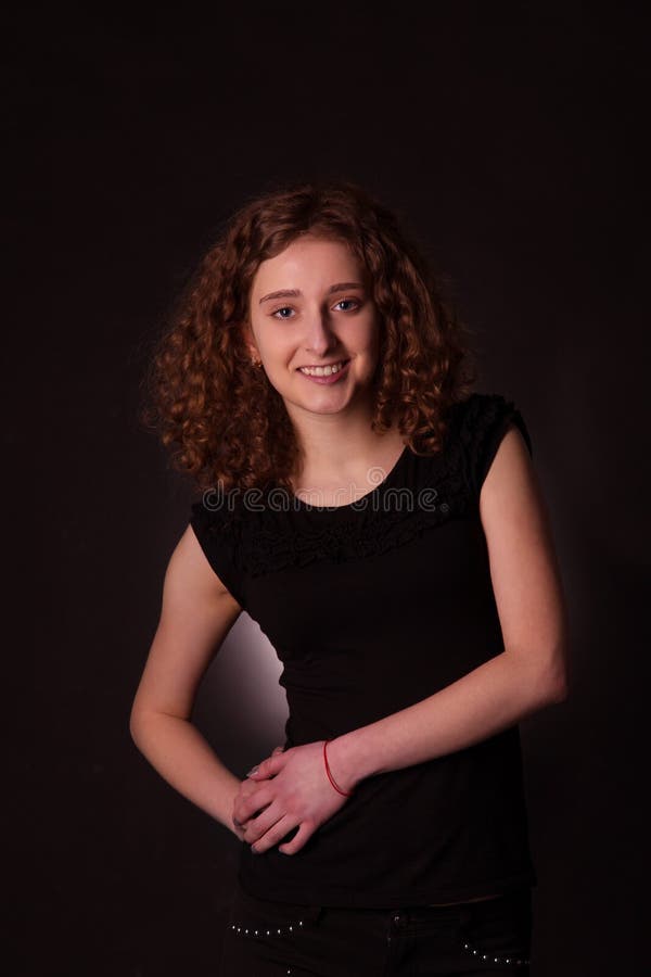 Low Key Shot of a Smiling Young Woman Stock Photo - Image of glamour ...