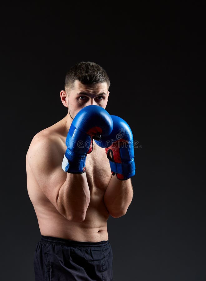 Low Key Studio Portrait of Handsome Muscular Fighter Preparing for ...