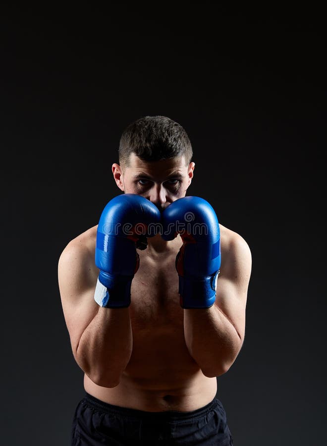Low Key Studio Portrait of Handsome Muscular Fighter Preparing for ...